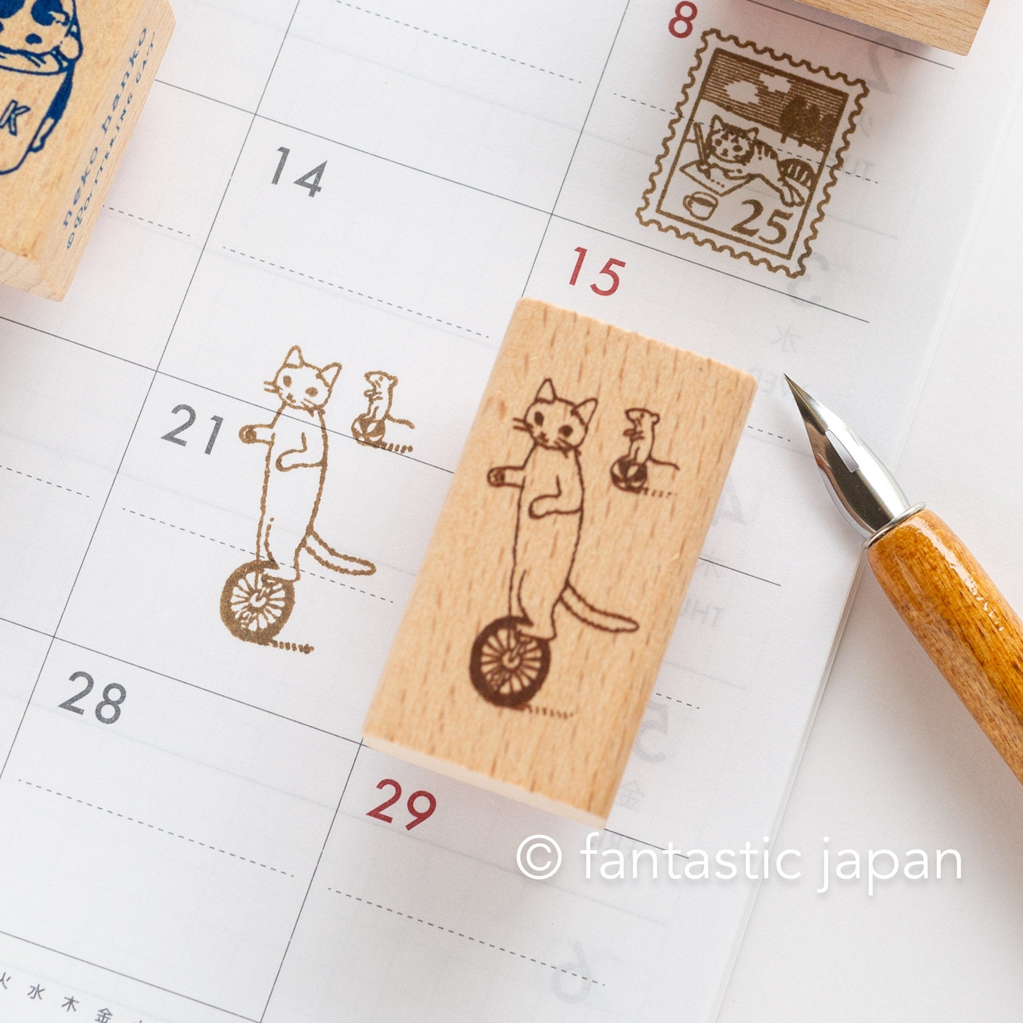 Pottering cat stamp small -unicycle- – Fantastic Japan